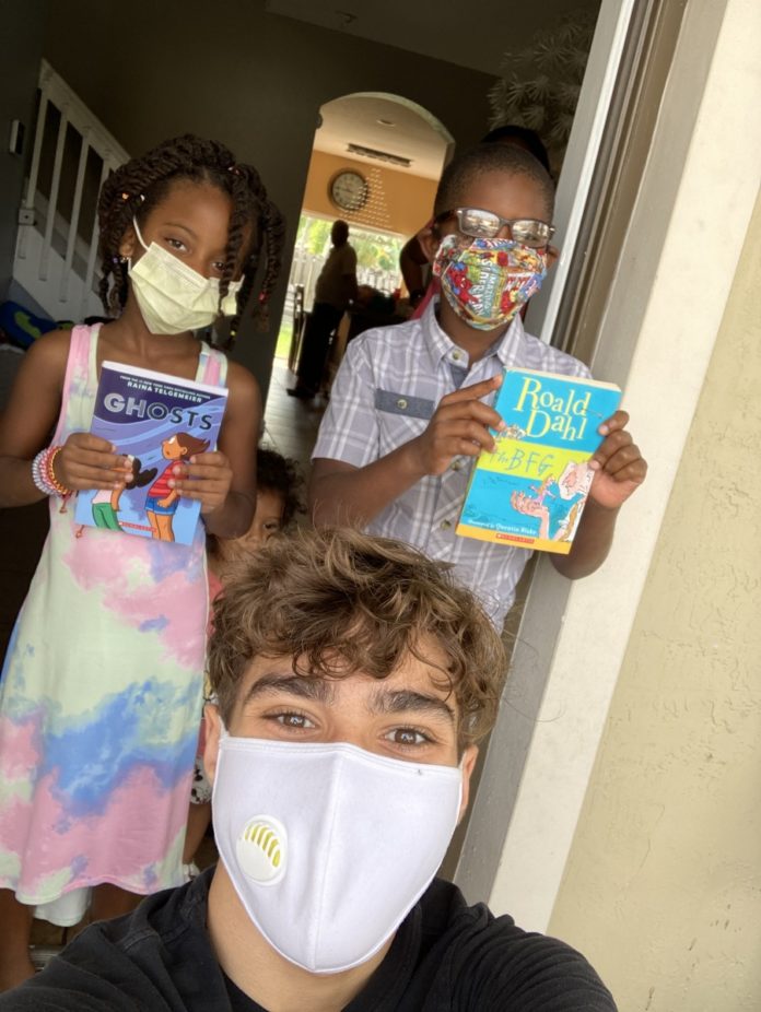 Student creates traveling library to bring books to kids at home ...