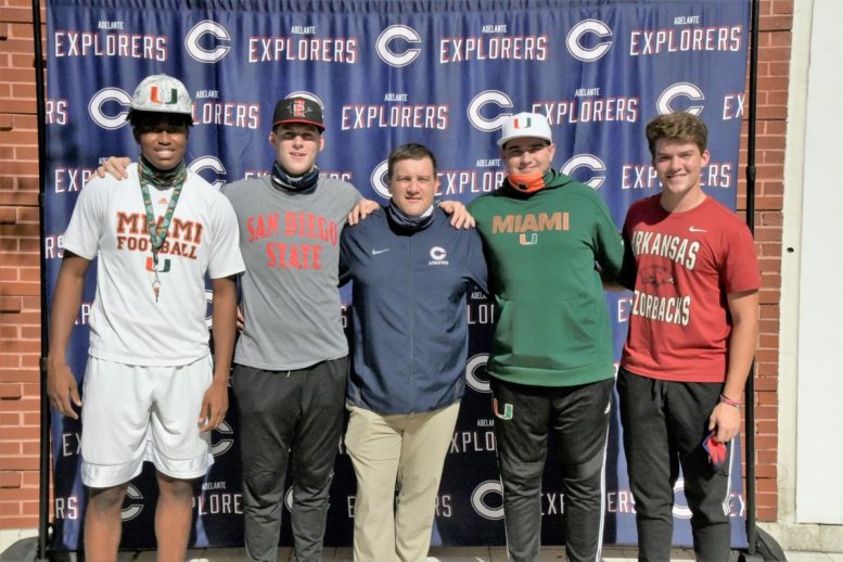Four Explorers football players sign National Letters of Intent | Featured#